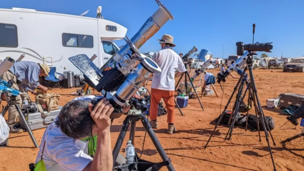 Solar eclipse: Thousands flock to remote Australian town for rare ...